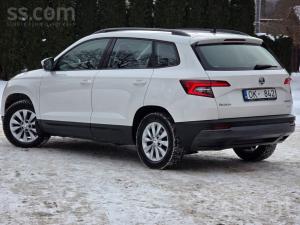 White Skoda Karoq 2019 in Riga, with an engine capacity of 2.00 L and mileage of 0 thousand km for 13950 €, photo 3 on AUTOMOTO.COM.LV