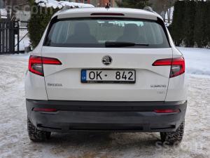 White Skoda Karoq 2019 in Riga, with an engine capacity of 2.00 L and mileage of 0 thousand km for 13950 €, photo 4 on AUTOMOTO.COM.LV