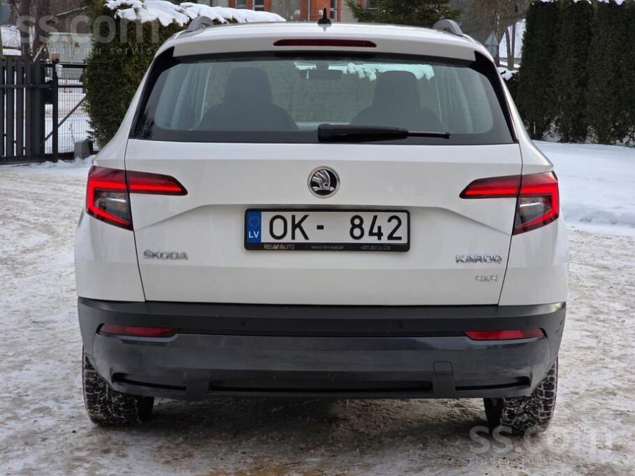 White Skoda Karoq 2019 in Riga, with an engine capacity of 2.00 L and mileage of 0 thousand km for 13950 €, photo 4 on AUTOMOTO.COM.LV