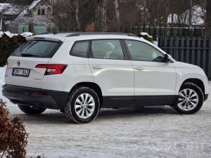 White Skoda Karoq 2019 in Riga, with an engine capacity of 2.00 L and mileage of 0 thousand km for 13950 €, photo 5 on AUTOMOTO.COM.LV