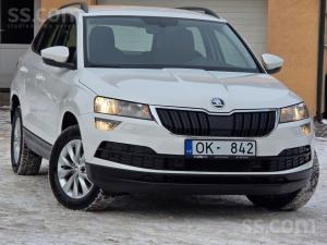 White Skoda Karoq 2019 in Riga, with an engine capacity of 2.00 L and mileage of 0 thousand km for 13950 €, photo 7 on AUTOMOTO.COM.LV
