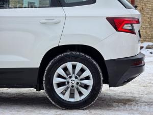 White Skoda Karoq 2019 in Riga, with an engine capacity of 2.00 L and mileage of 0 thousand km for 13950 €, photo 10 on AUTOMOTO.COM.LV