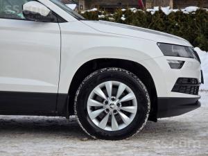 White Skoda Karoq 2019 in Riga, with an engine capacity of 2.00 L and mileage of 0 thousand km for 13950 €, photo 12 on AUTOMOTO.COM.LV
