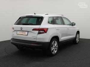White Skoda Karoq 2019 in Vilnius, with an engine capacity of 2.00 L and mileage of 188 thousand km for 17499 €, photo 8 on AUTOMOTO.COM.LV