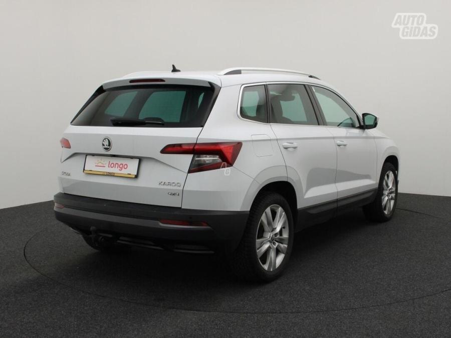 White Skoda Karoq 2019 in Vilnius, with an engine capacity of 2.00 L and mileage of 188 thousand km for 17499 €, photo 8 on AUTOMOTO.COM.LV