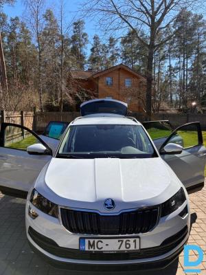 White Skoda Karoq 2019 in Riga, with an engine capacity of 1.60 L and mileage of 183 thousand km for 14500 €, photo  on AUTOMOTO.COM.LV