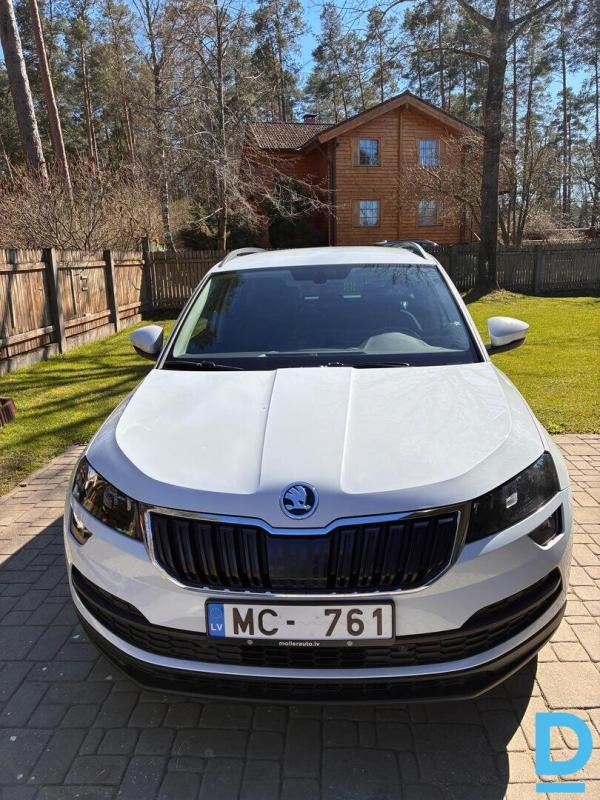 White Skoda Karoq 2019 in Riga, with an engine capacity of 1.60 L and mileage of 183 thousand km for 14500 €, photo 2 on AUTOMOTO.COM.LV