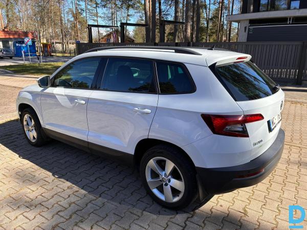 White Skoda Karoq 2019 in Riga, with an engine capacity of 1.60 L and mileage of 183 thousand km for 14500 €, photo 4 on AUTOMOTO.COM.LV