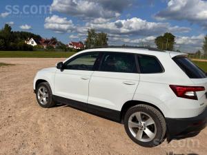 White Skoda Karoq 2019 in Riga, with an engine capacity of 1.60 L and mileage of 188 thousand km for 14500 €, photo 4 on AUTOMOTO.COM.LV