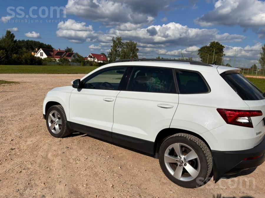 White Skoda Karoq 2019 in Riga, with an engine capacity of 1.60 L and mileage of 188 thousand km for 14500 €, photo 4 on AUTOMOTO.COM.LV