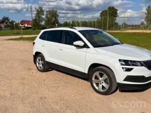White Skoda Karoq 2019 in Riga, with an engine capacity of 1.60 L and mileage of 188 thousand km for 14500 €, photo 5 on AUTOMOTO.COM.LV
