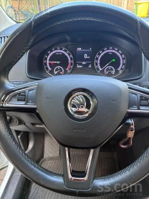 White Skoda Karoq 2019 in Riga, with an engine capacity of 1.60 L and mileage of 188 thousand km for 14500 €, photo 8 on AUTOMOTO.COM.LV