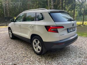 White Skoda Karoq 2019 in Riga, with an engine capacity of 2.00 L and mileage of 182 thousand km for 16000 €, photo 5 on AUTOMOTO.COM.LV