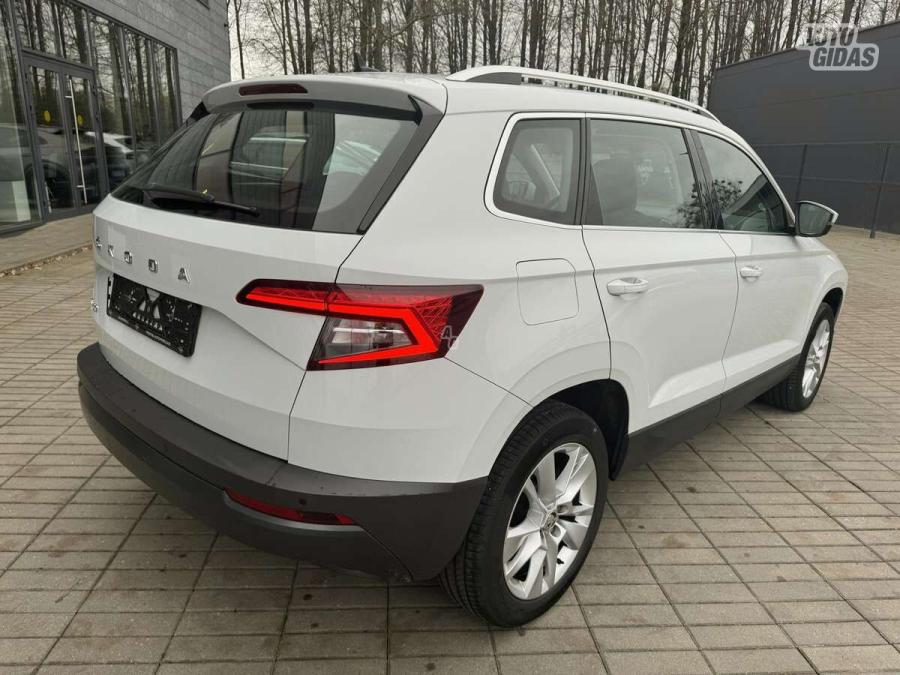 White Skoda Karoq 2020 in Kaunas, with an engine capacity of 1.00 L and mileage of 188 thousand km for 12900 €, photo 4 on AUTOMOTO.COM.LV