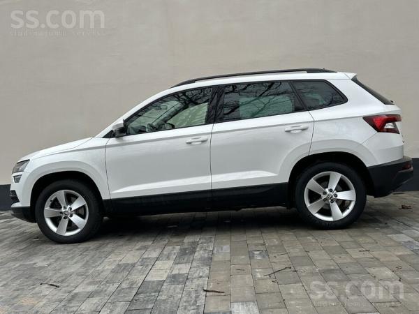 White Skoda Karoq 2020 in Riga, with an engine capacity of 2.00 L and mileage of 191 thousand km for 15800 €, photo 7 on AUTOMOTO.COM.LV
