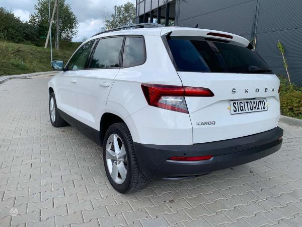 Skoda Karoq 2020 in Vilnius on AUTOMOTO.COM.LV White Skoda Karoq 2020 in Vilnius, with an engine capacity of 1.60 L and mileage of 176 thousand km for 11616 €, photo 6 on AUTOMOTO.COM.LV