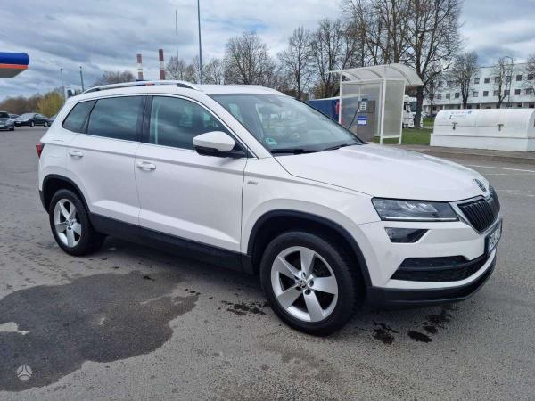 White Skoda Karoq 2020 in Kaunas, with an engine capacity of 1.97 L and mileage of 268 thousand km for 15150 €, photo 4 on AUTOMOTO.COM.LV