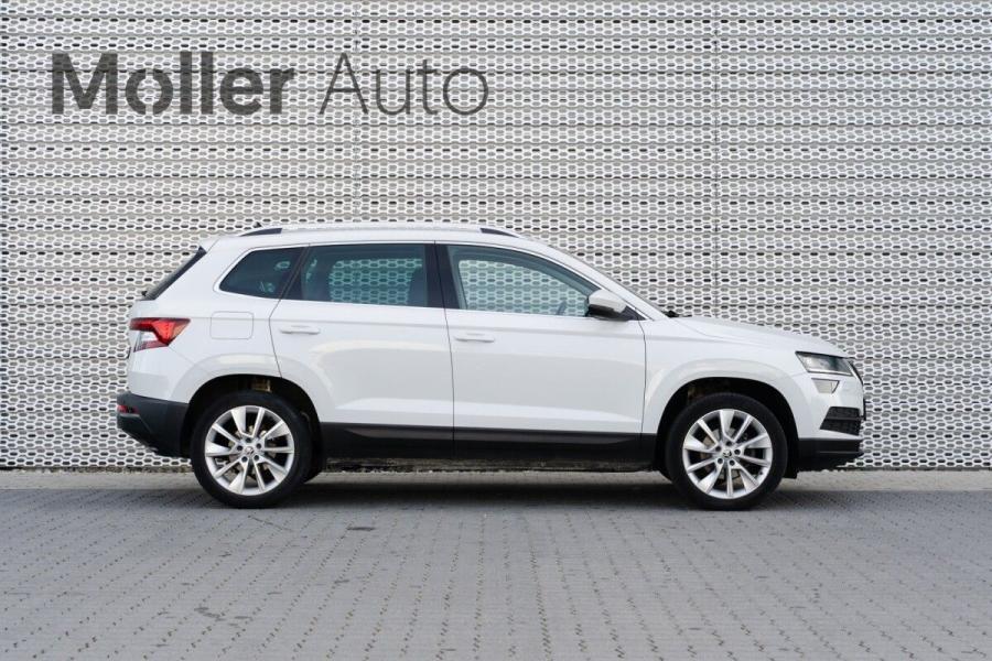 White Skoda Karoq 2020 in Marupe, with an engine capacity of 1.60 L and mileage of 152 thousand km for 17900 €, photo 6 on AUTOMOTO.COM.LV