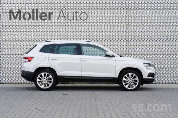 White Skoda Karoq 2020 in Riga, with an engine capacity of 1.60 L and mileage of 152 thousand km for 17900 €, photo 6 on AUTOMOTO.COM.LV