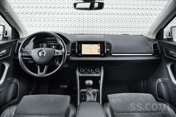 White Skoda Karoq 2020 in Riga, with an engine capacity of 1.60 L and mileage of 152 thousand km for 17900 €, photo 7 on AUTOMOTO.COM.LV