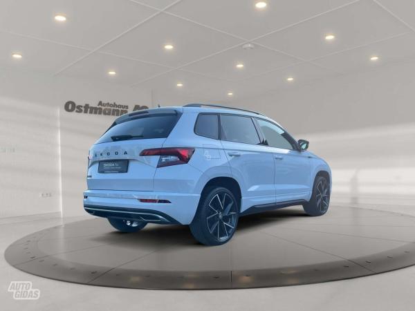 White Skoda Karoq 2021 in Kaunas, with an engine capacity of 1.50 L and mileage of 36 thousand km for 33197 €, photo 5 on AUTOMOTO.COM.LV