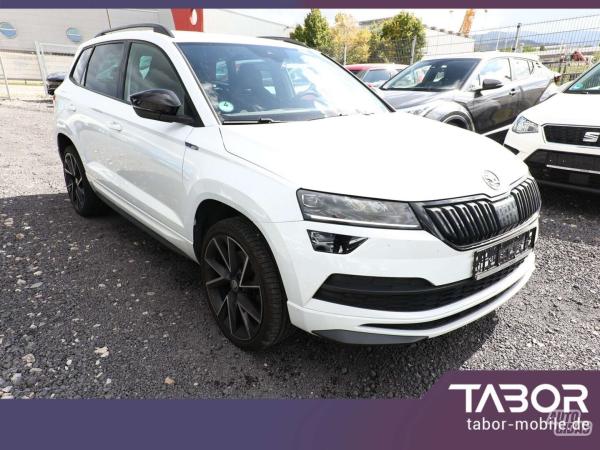 White Skoda Karoq 2021 in Kaunas, with an engine capacity of 1.50 L and mileage of 49 thousand km for 25478 €, photo 2 on AUTOMOTO.COM.LV