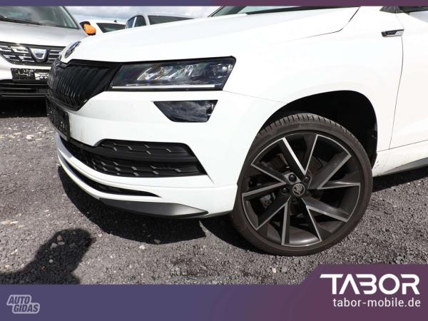 White Skoda Karoq 2021 in Kaunas, with an engine capacity of 1.50 L and mileage of 49 thousand km for 25478 €, photo 5 on AUTOMOTO.COM.LV