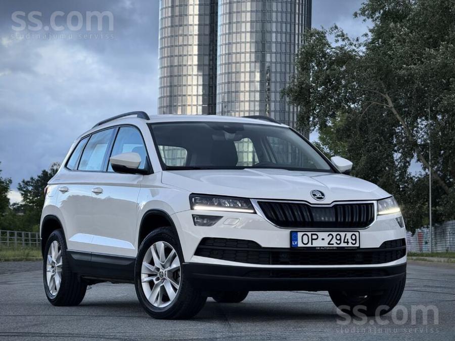 White Skoda Karoq 2021 in Riga, with an engine capacity of 2.00 L and mileage of 112 thousand km for 19990 €, photo 3 on AUTOMOTO.COM.LV