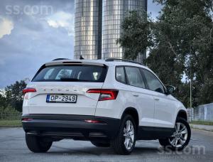 White Skoda Karoq 2021 in Riga, with an engine capacity of 2.00 L and mileage of 112 thousand km for 19990 €, photo 5 on AUTOMOTO.COM.LV
