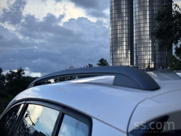 White Skoda Karoq 2021 in Riga, with an engine capacity of 2.00 L and mileage of 112 thousand km for 19990 €, photo 7 on AUTOMOTO.COM.LV