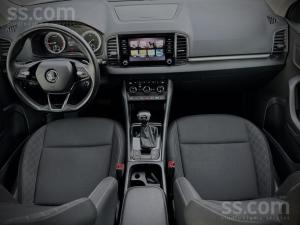 White Skoda Karoq 2021 in Riga, with an engine capacity of 2.00 L and mileage of 112 thousand km for 19990 €, photo 11 on AUTOMOTO.COM.LV