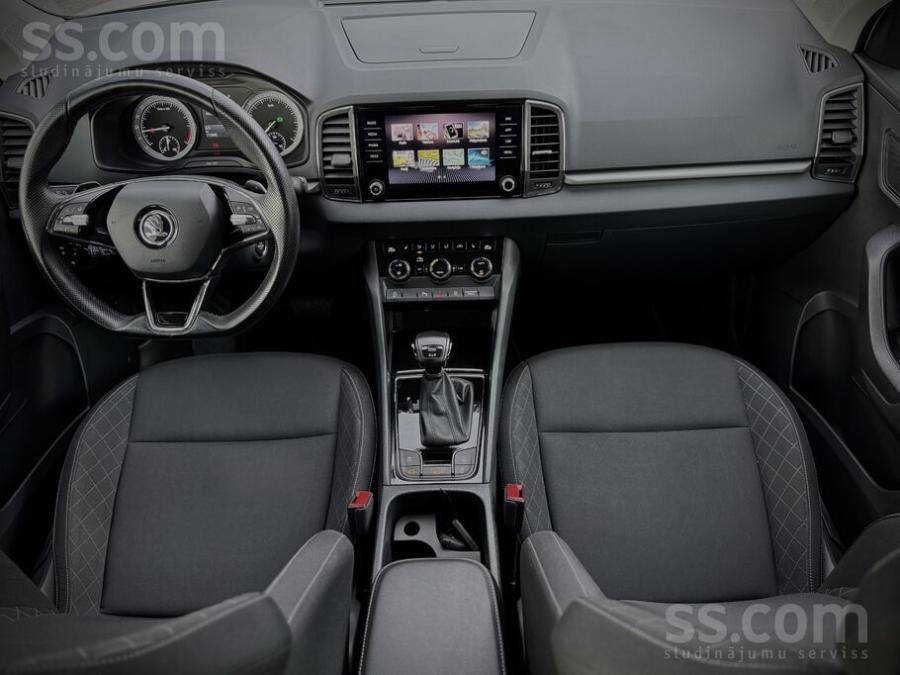 White Skoda Karoq 2021 in Riga, with an engine capacity of 2.00 L and mileage of 112 thousand km for 19990 €, photo 11 on AUTOMOTO.COM.LV