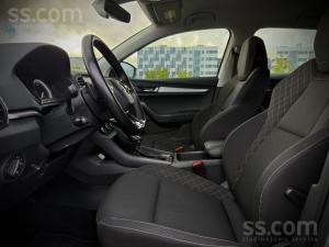 White Skoda Karoq 2021 in Riga, with an engine capacity of 2.00 L and mileage of 112 thousand km for 19990 €, photo 12 on AUTOMOTO.COM.LV