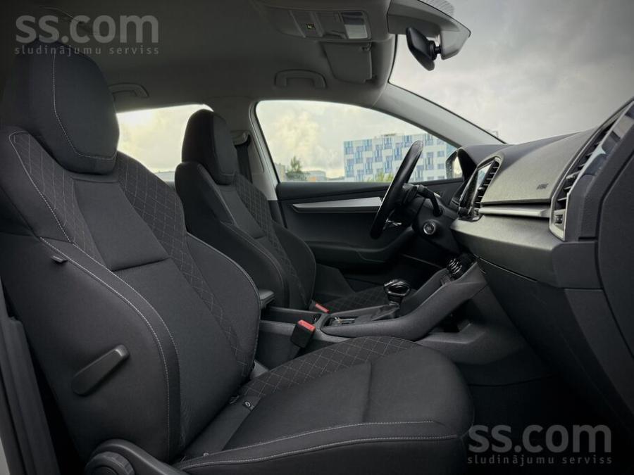 White Skoda Karoq 2021 in Riga, with an engine capacity of 2.00 L and mileage of 112 thousand km for 19990 €, photo 13 on AUTOMOTO.COM.LV