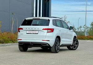 White Skoda Karoq 2021 in Vilnius, with an engine capacity of 1.50 L and mileage of 235 thousand km for 16990 €, photo 5 on AUTOMOTO.COM.LV