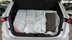 White Skoda Karoq 2022 in Riga, with an engine capacity of 1.50 L and mileage of 78 thousand km for 2490000 €, photo 13 on AUTOMOTO.COM.LV