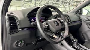 White Skoda Karoq 2022 in Riga, with an engine capacity of 1.50 L and mileage of 78 thousand km for 2490000 €, photo 18 on AUTOMOTO.COM.LV