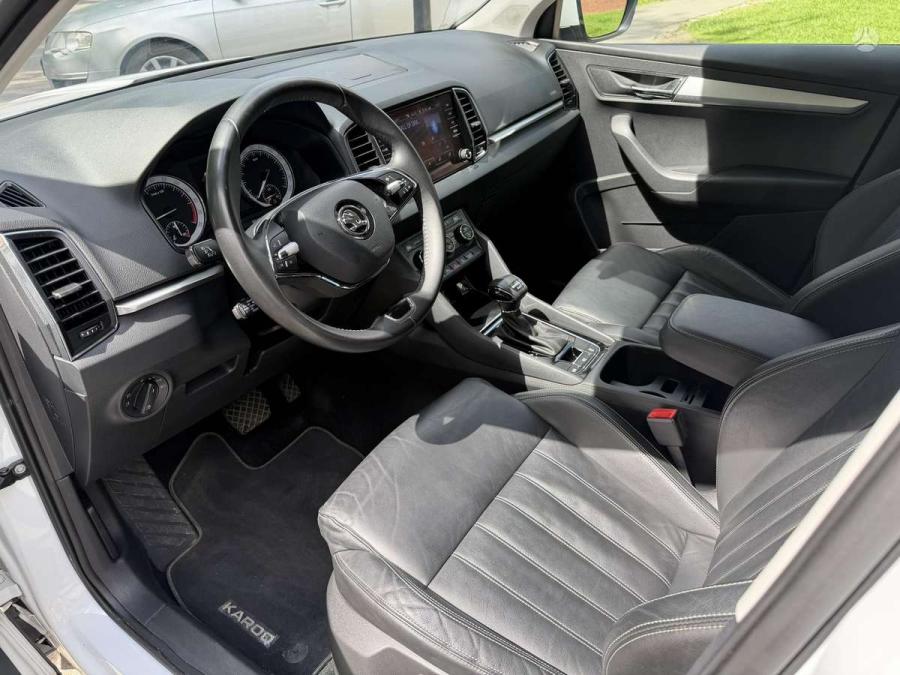 White Skoda Karoq 2022 in Vilnius, with an engine capacity of 1.97 L and mileage of 206 thousand km for 18400 €, photo 12 on AUTOMOTO.COM.LV