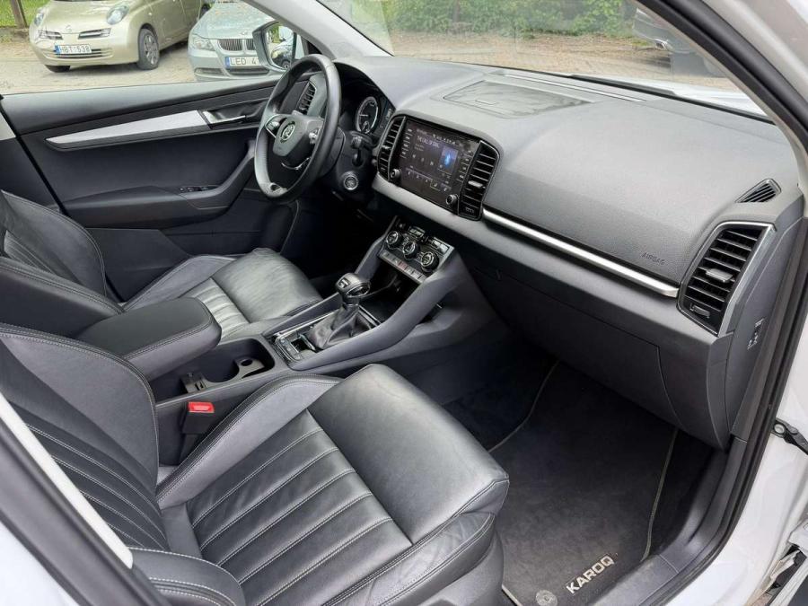 White Skoda Karoq 2022 in Vilnius, with an engine capacity of 1.97 L and mileage of 206 thousand km for 18400 €, photo 13 on AUTOMOTO.COM.LV
