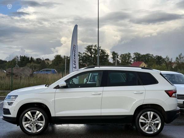 White Skoda Karoq 2022 in Vilnius, with an engine capacity of 1.50 L and mileage of 200 thousand km for 16800 €, photo 4 on AUTOMOTO.COM.LV