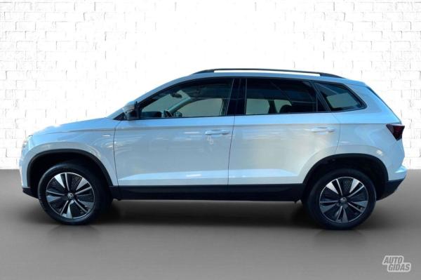 White Skoda Karoq 2023 in Kaunas, with an engine capacity of 1.50 L and mileage of 70 thousand km for 29008 €, photo 2 on AUTOMOTO.COM.LV