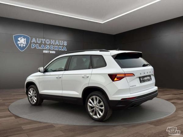 White Skoda Karoq 2023 in Kaunas, with an engine capacity of 1.50 L and mileage of 46 thousand km for 28454 €, photo 7 on AUTOMOTO.COM.LV