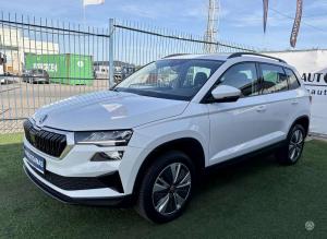 White Skoda Karoq 2023 in Panevezys, with an engine capacity of 1.97 L and mileage of 179 thousand km for 16950 €, photo  on AUTOMOTO.COM.LV