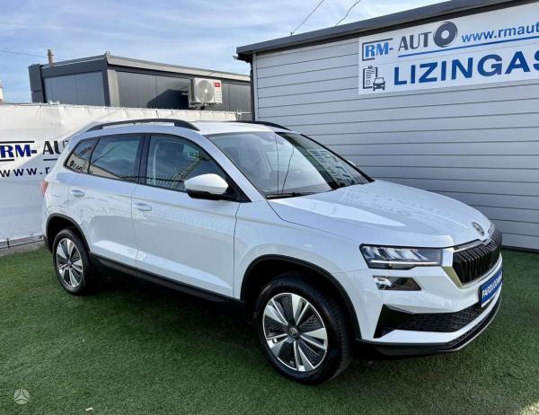 White Skoda Karoq 2023 in Panevezys, with an engine capacity of 1.97 L and mileage of 179 thousand km for 16950 €, photo 3 on AUTOMOTO.COM.LV