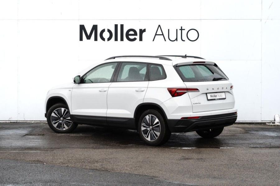 White Skoda Karoq 2023 in Riga, with an engine capacity of 1.50 L and mileage of 147 thousand km for 21900 €, photo 4 on AUTOMOTO.COM.LV