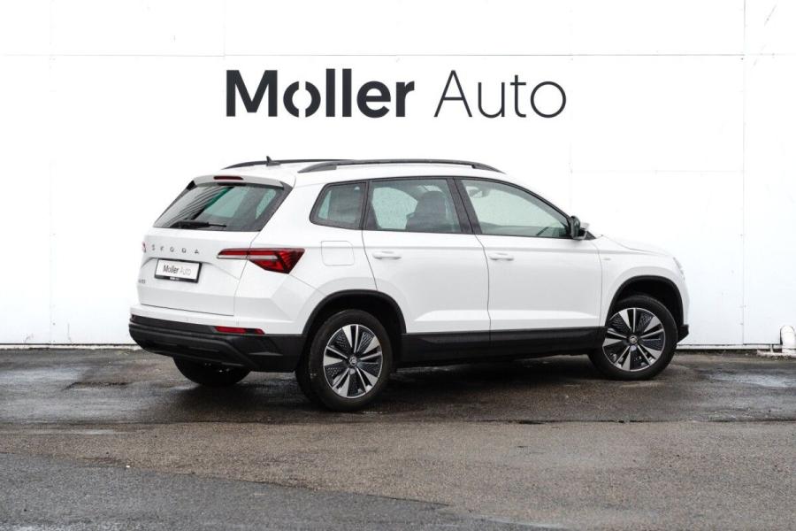 White Skoda Karoq 2023 in Riga, with an engine capacity of 1.50 L and mileage of 147 thousand km for 21900 €, photo 5 on AUTOMOTO.COM.LV