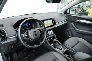 White Skoda Karoq 2023 in Riga, with an engine capacity of 1.50 L and mileage of 147 thousand km for 21900 €, photo 27 on AUTOMOTO.COM.LV