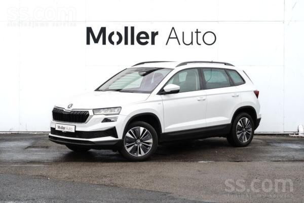 White Skoda Karoq 2023 in Riga, with an engine capacity of 1.50 L and mileage of 147 thousand km for 21900 €, photo 1 on AUTOMOTO.COM.LV