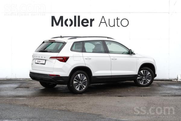 White Skoda Karoq 2023 in Riga, with an engine capacity of 1.50 L and mileage of 147 thousand km for 21900 €, photo 5 on AUTOMOTO.COM.LV