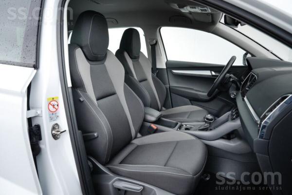 White Skoda Karoq 2023 in Riga, with an engine capacity of 1.50 L and mileage of 147 thousand km for 21900 €, photo 8 on AUTOMOTO.COM.LV